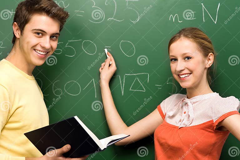 Students Doing Math on Chalkboard Stock Image - Image of learning ...