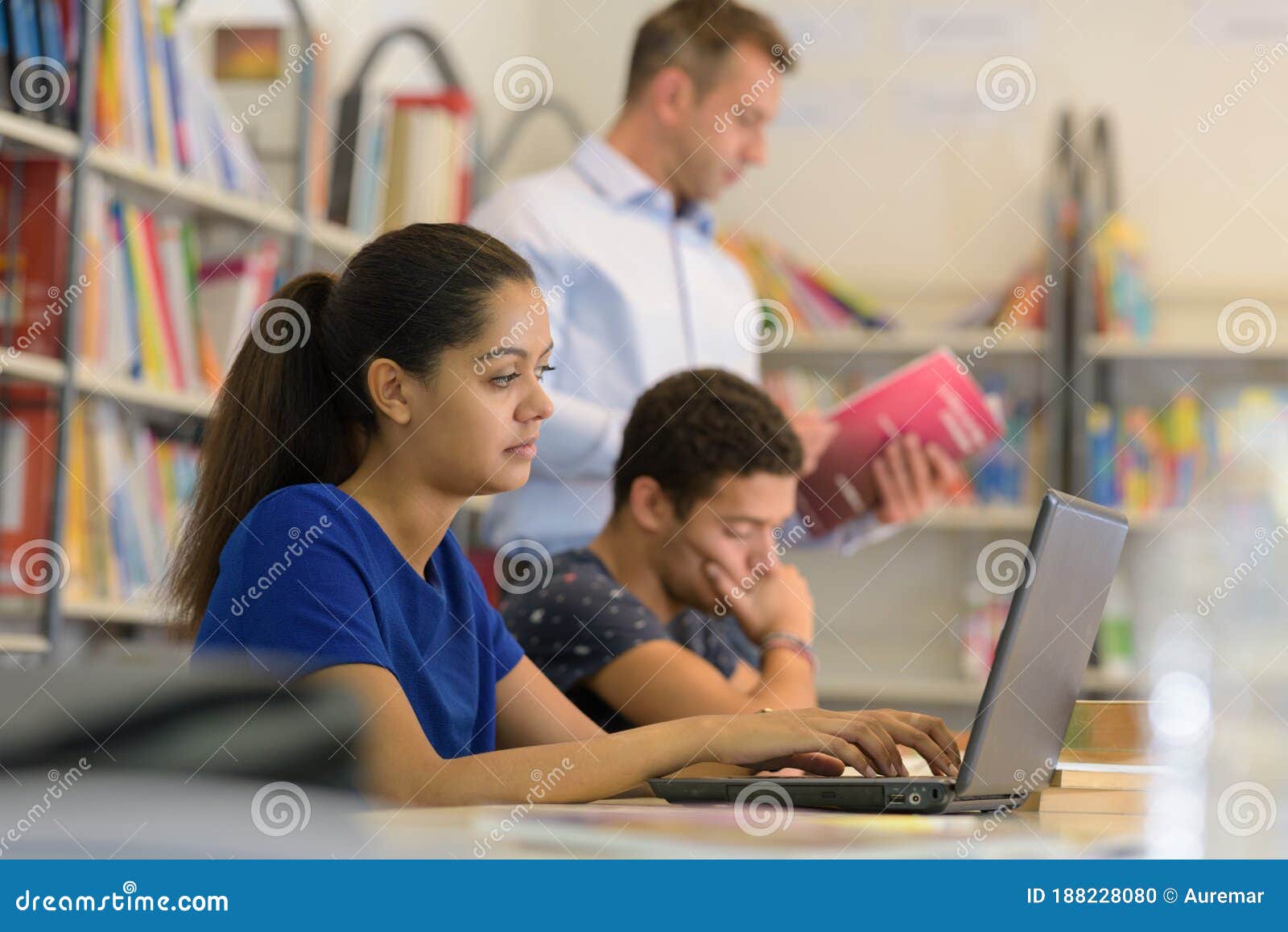 Students Doing Research in Campus Library Stock Photo - Image of ...