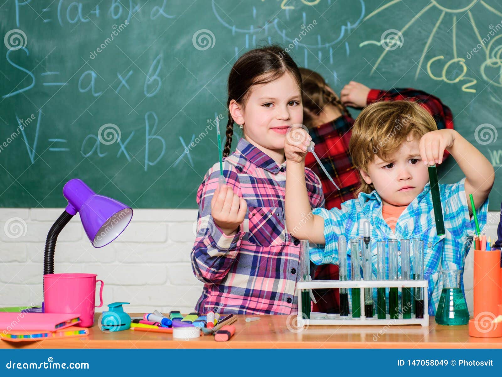 Students Doing Science Experiments with Microscope in Lab. Back To ...