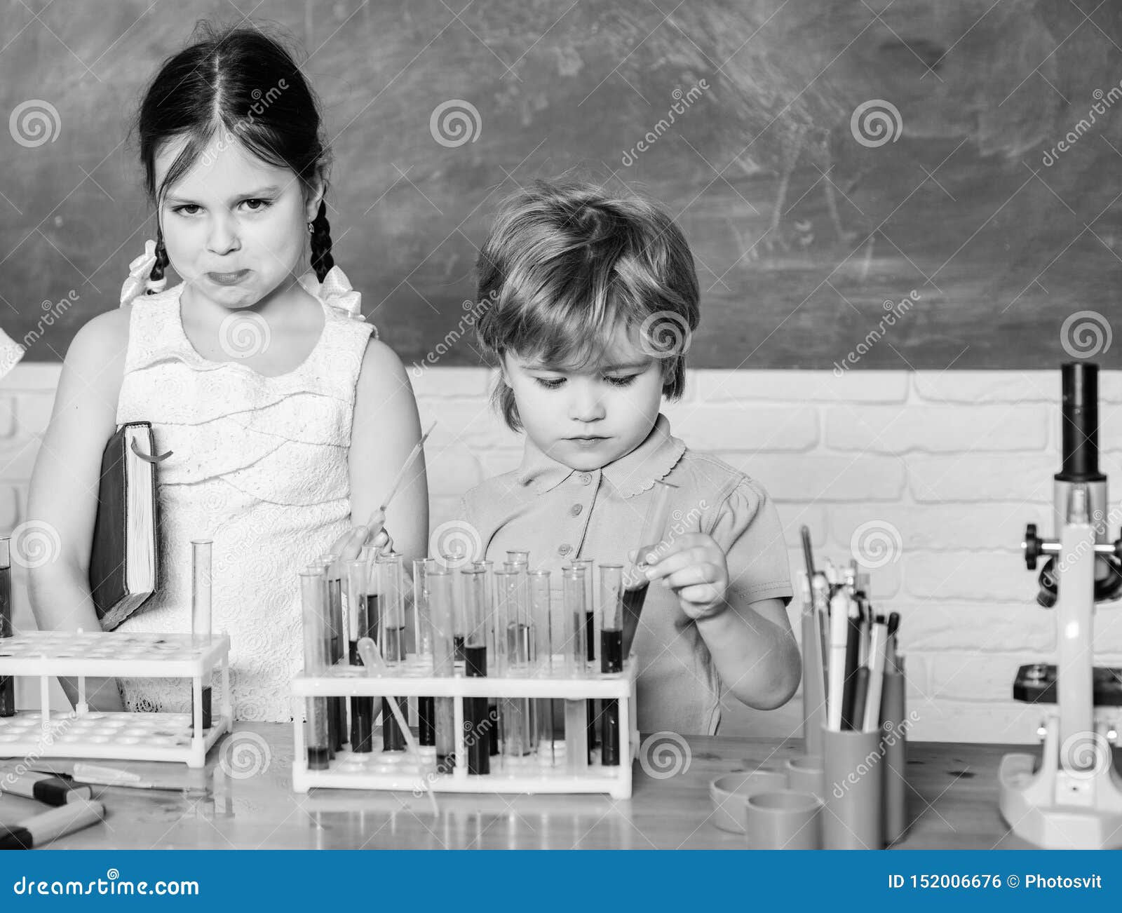 Students Doing Science Experiments with Microscope in Lab. Back To ...