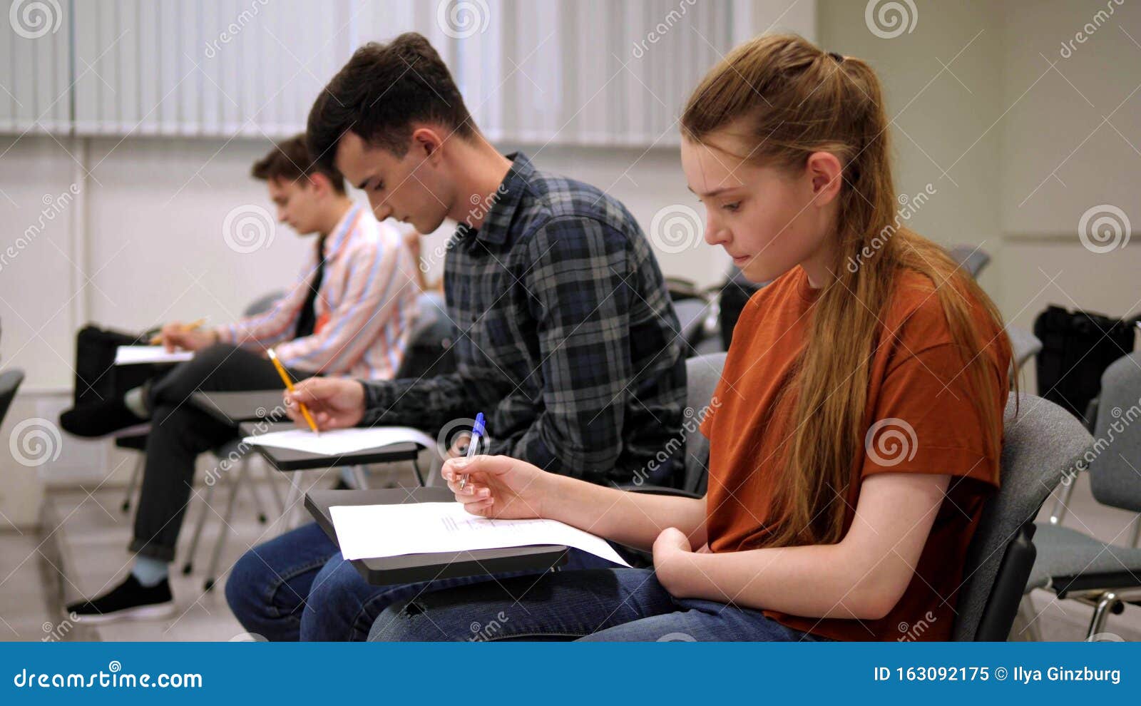 Students are Doing a Test in Classroom. Stock Image - Image of bachelor ...