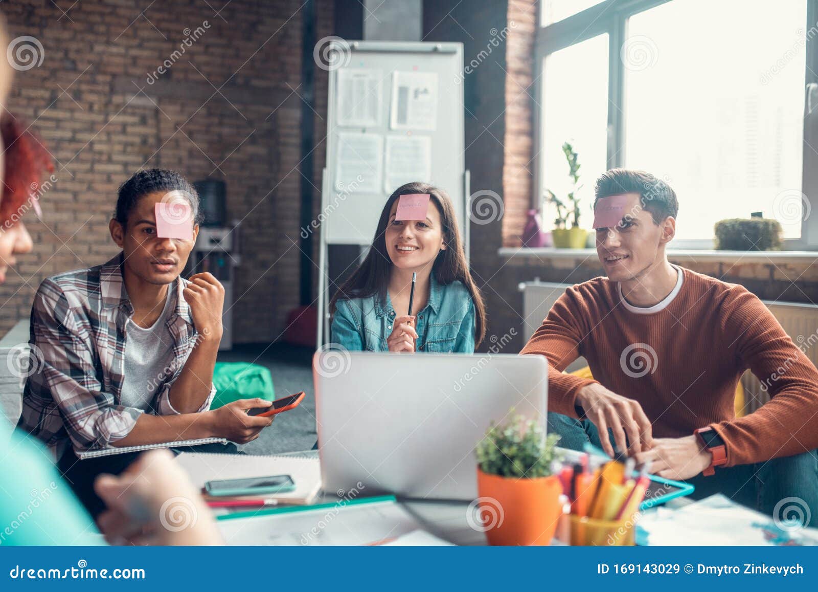 Students Feeling Curious while Playing Word Game Together Stock Image ...