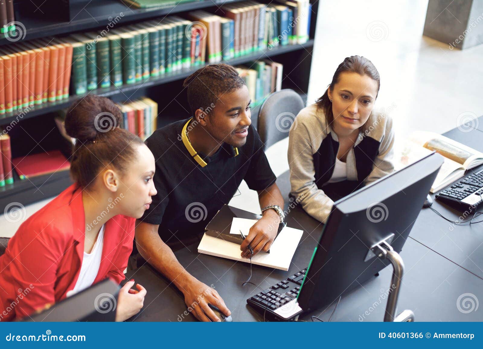 Students Finding Information on Computer for School Project Stock Photo ...