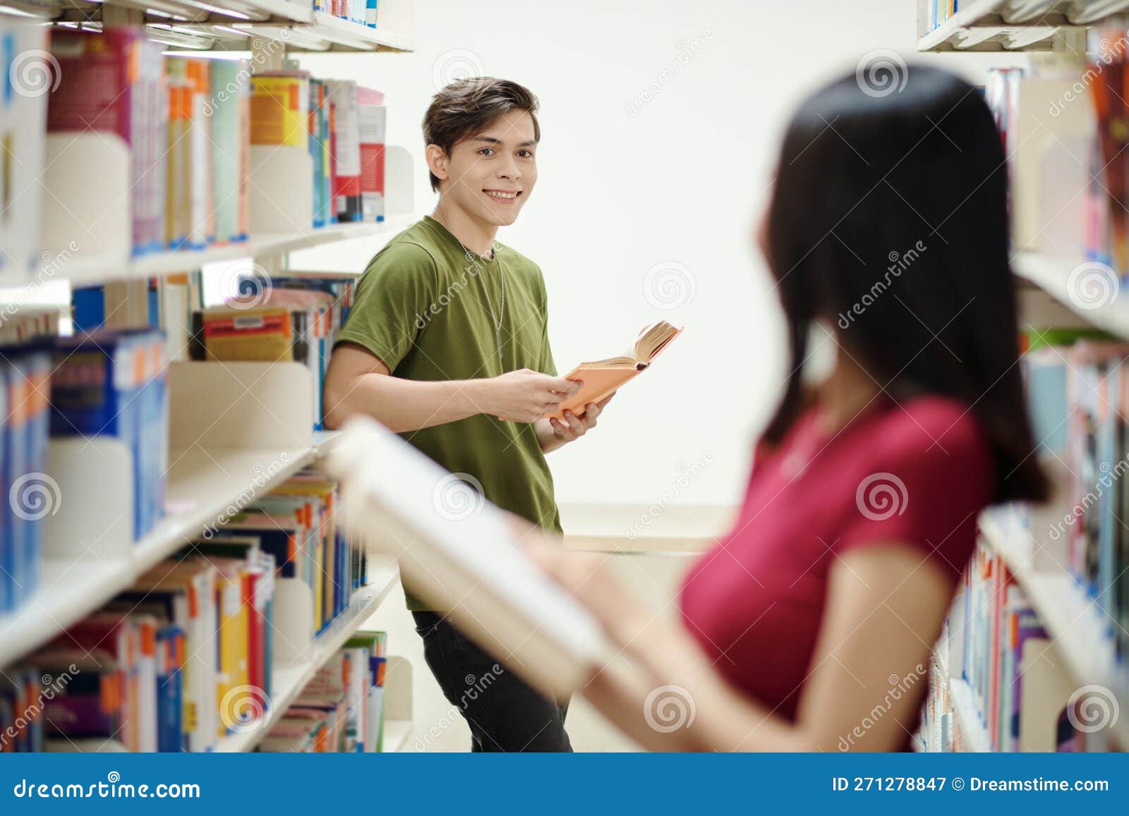 Students Flirting in Library Stock Image - Image of bookstore, textbook ...