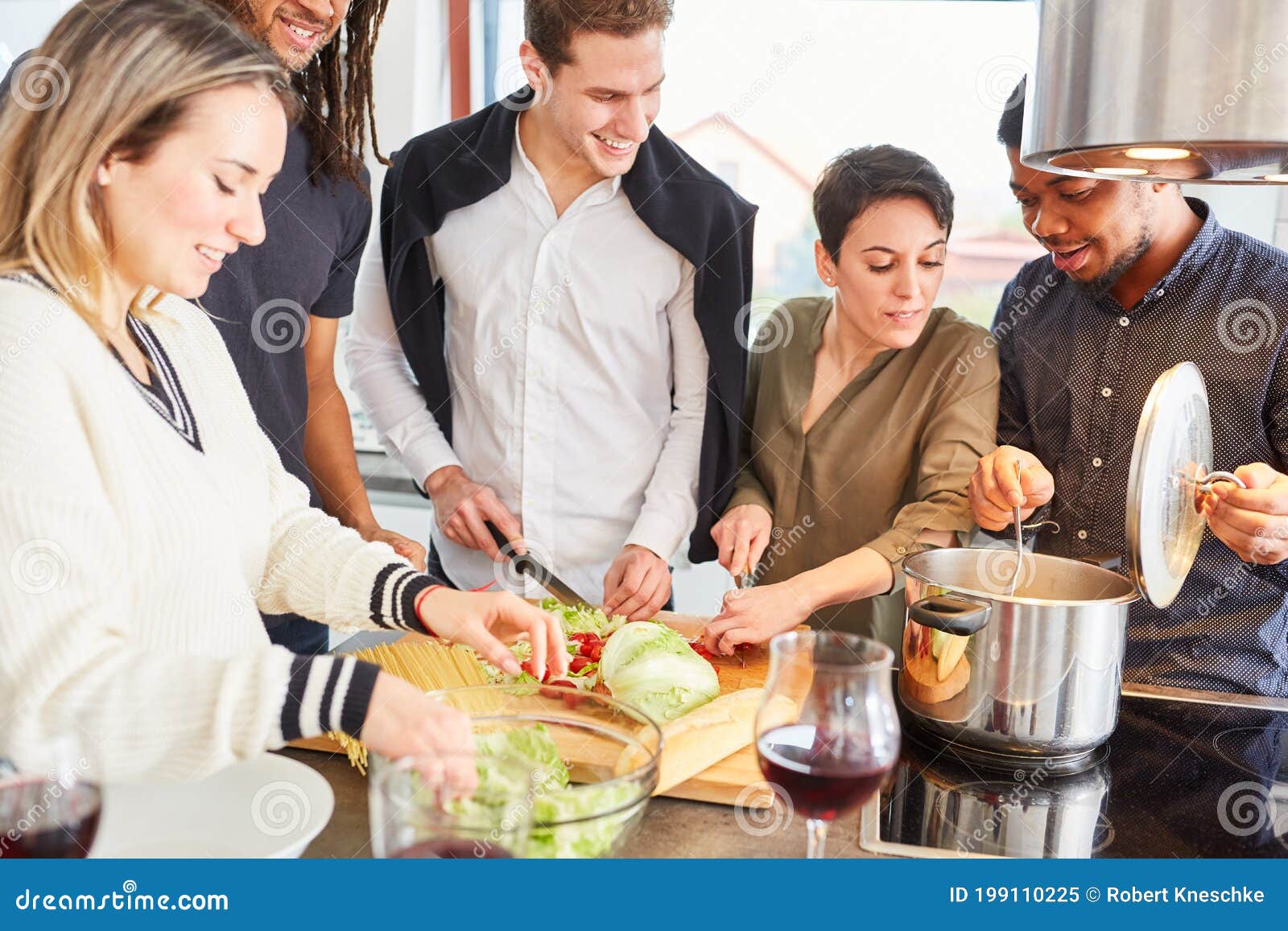 Students and Friends Prepare Meals Together in Shared Kitchen Stock ...