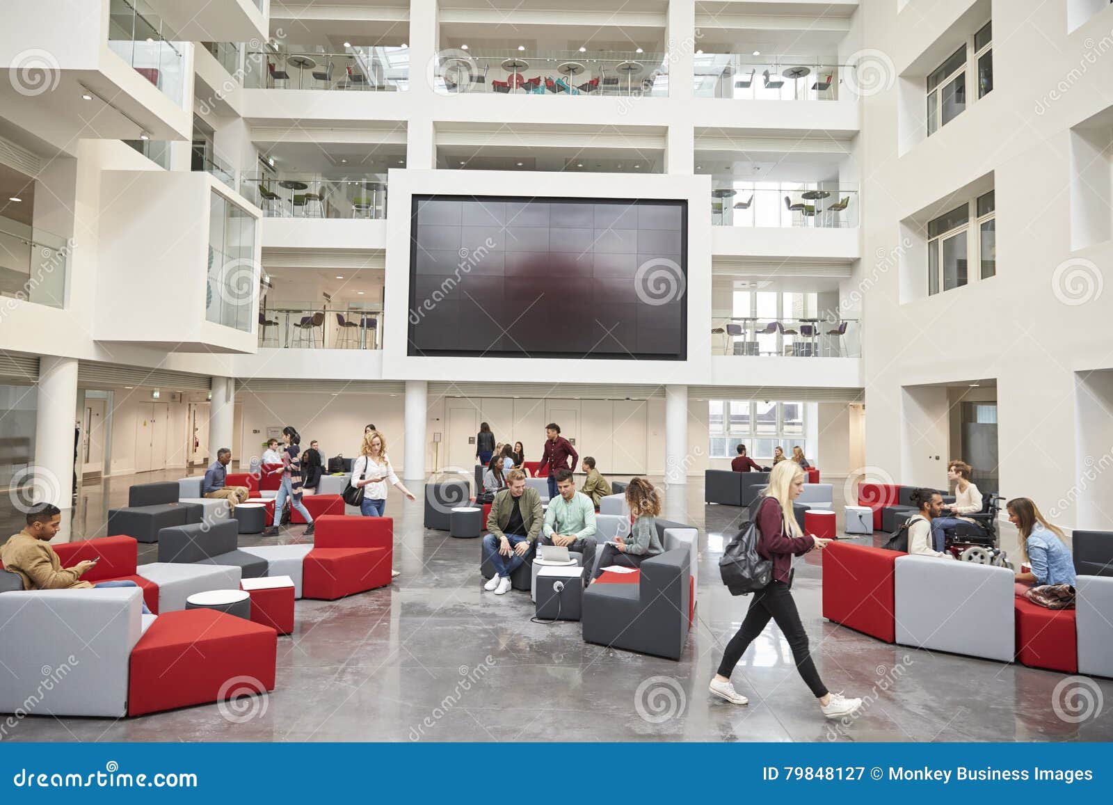 Students in Front of Screen in Atrium of Modern University Stock Image ...