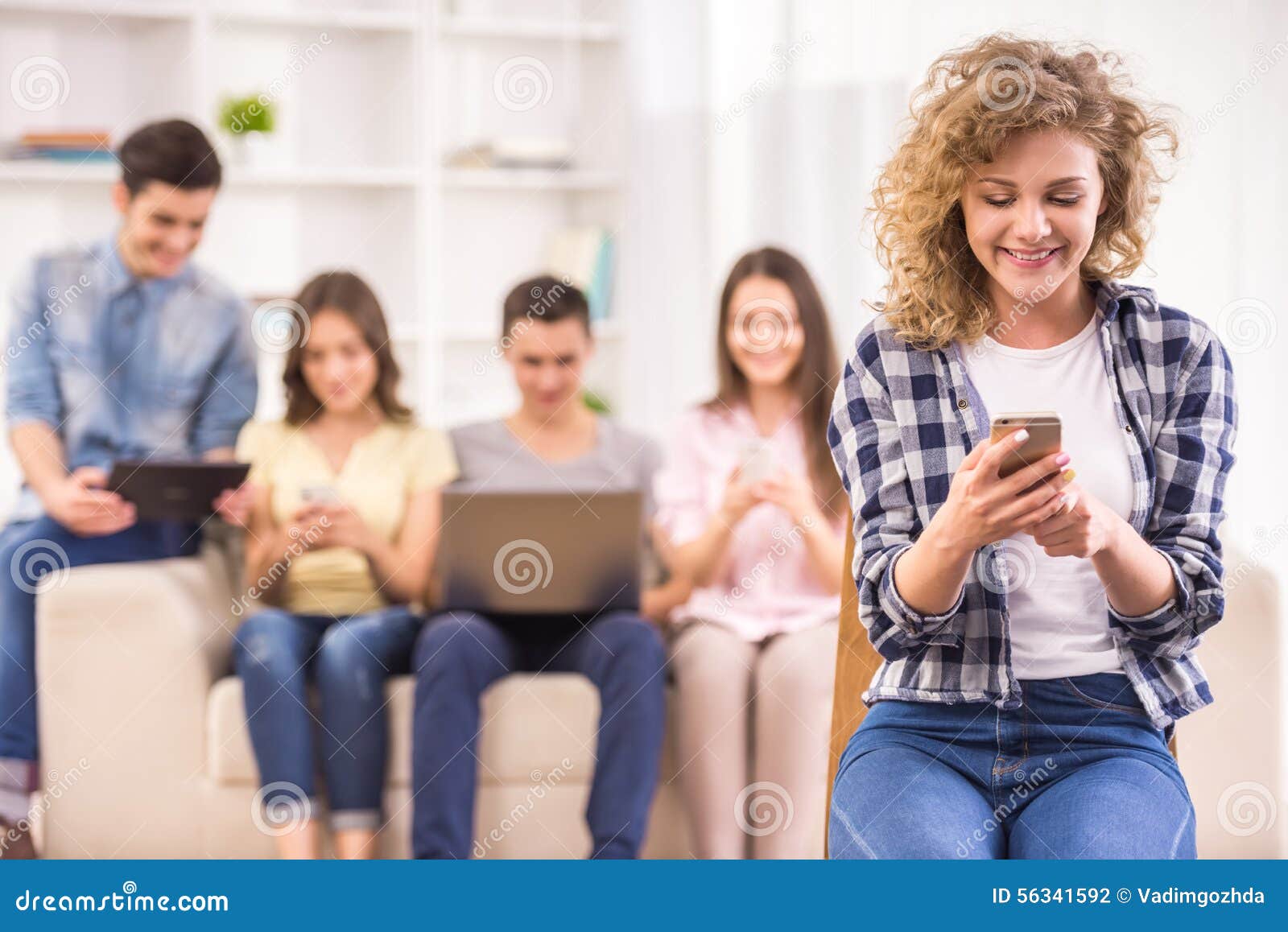 Students with gadgets stock photo. Image of modern, casual - 56341592