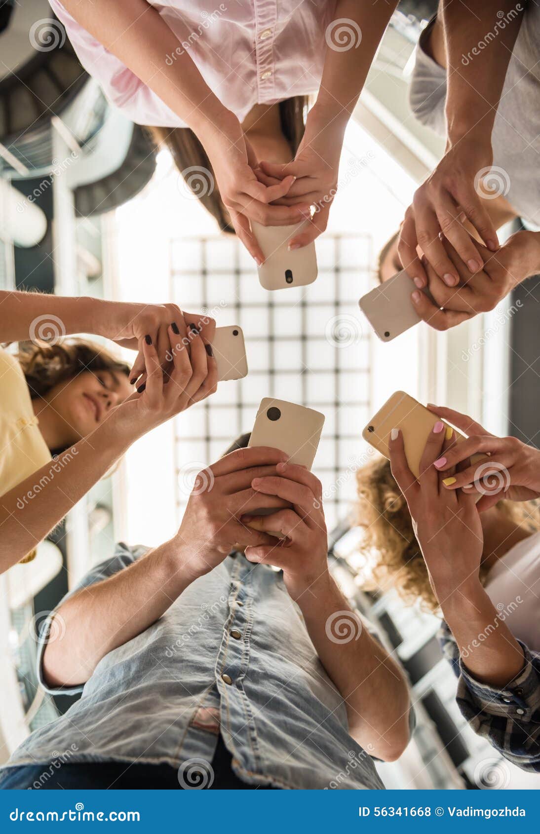 Students with gadgets stock photo. Image of heads, person - 56341668