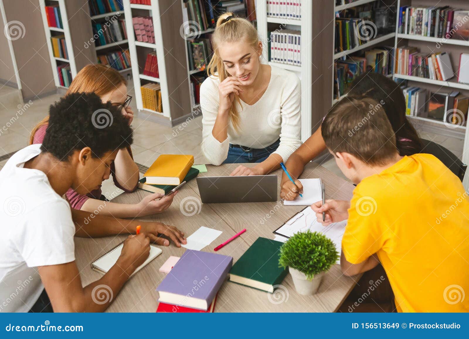 Students Gathering in Circle, Making Homework Together Stock Image ...