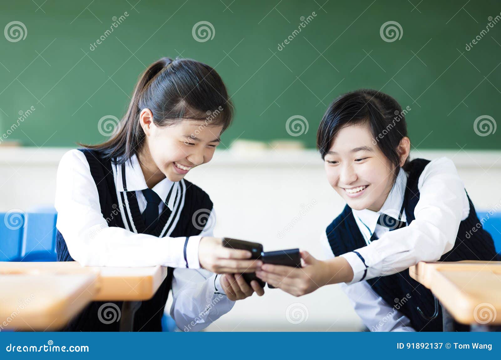 Students Girls Watching the Smart Phone in Classroom Stock Image ...
