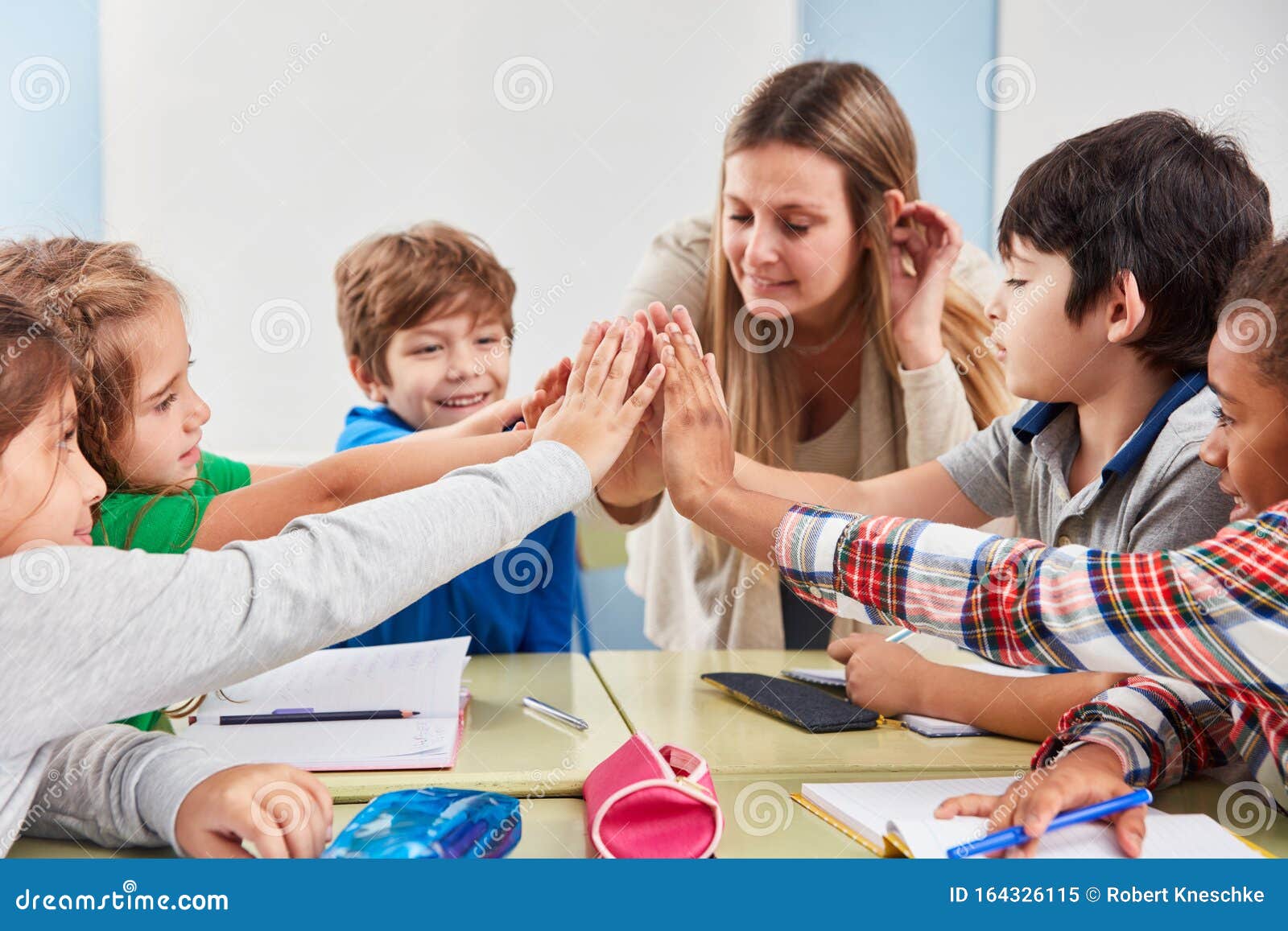 Students Give Themselves High Five for Cooperation Stock Image - Image ...