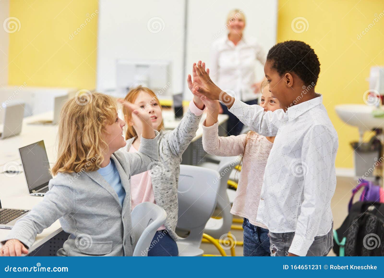Students Give Themselves a High Five Stock Image - Image of computer ...