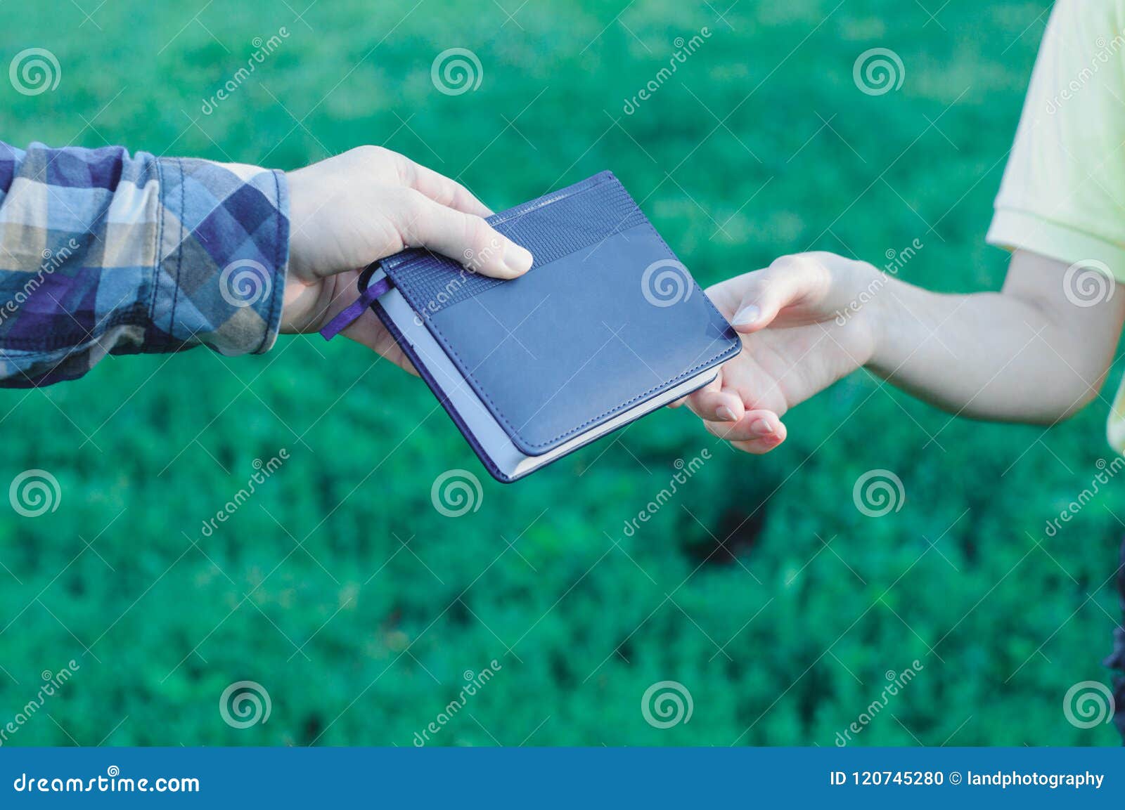 Students Giving a Notebook Each Other Stock Photo - Image of male ...