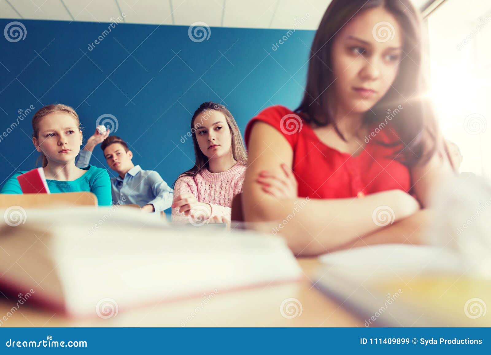 Students Gossiping Behind Classmate Back at School Stock Image - Image ...