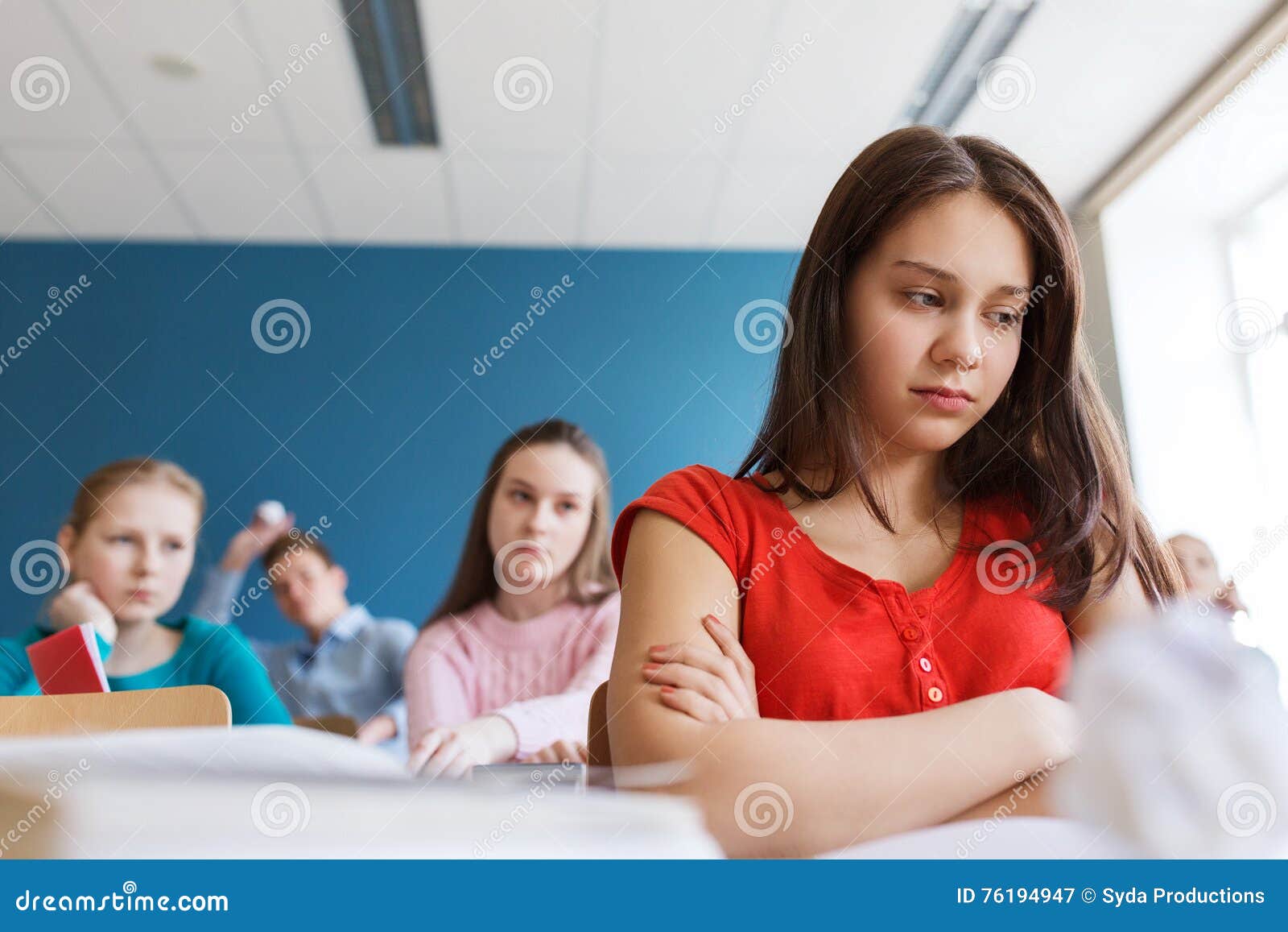 Students Gossiping Behind Classmate Back at School Stock Image - Image ...