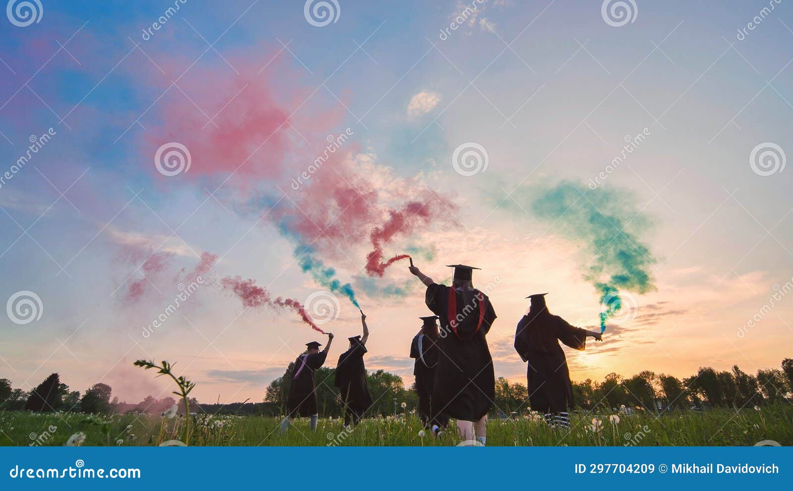 Students Graduate with Colored Smoke Walking through the Meadow in the ...