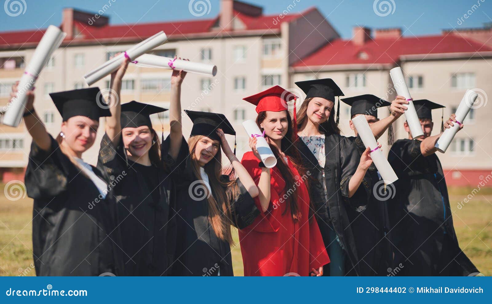 Students Graduate Holding Their Diplomas at the Top. Stock Photo ...