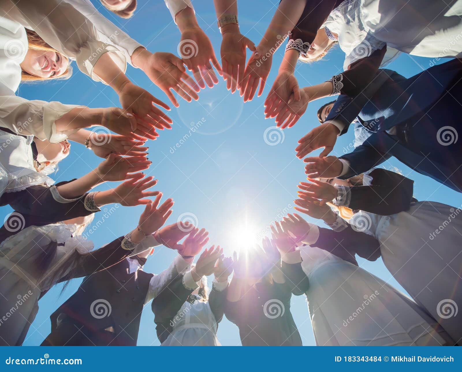 Students Graduates Make the Shape of a Circle from the Palms of Their ...