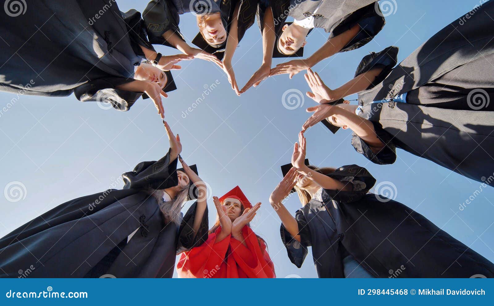 Students Graduating from the College Make a Heart Out of Their Hands ...