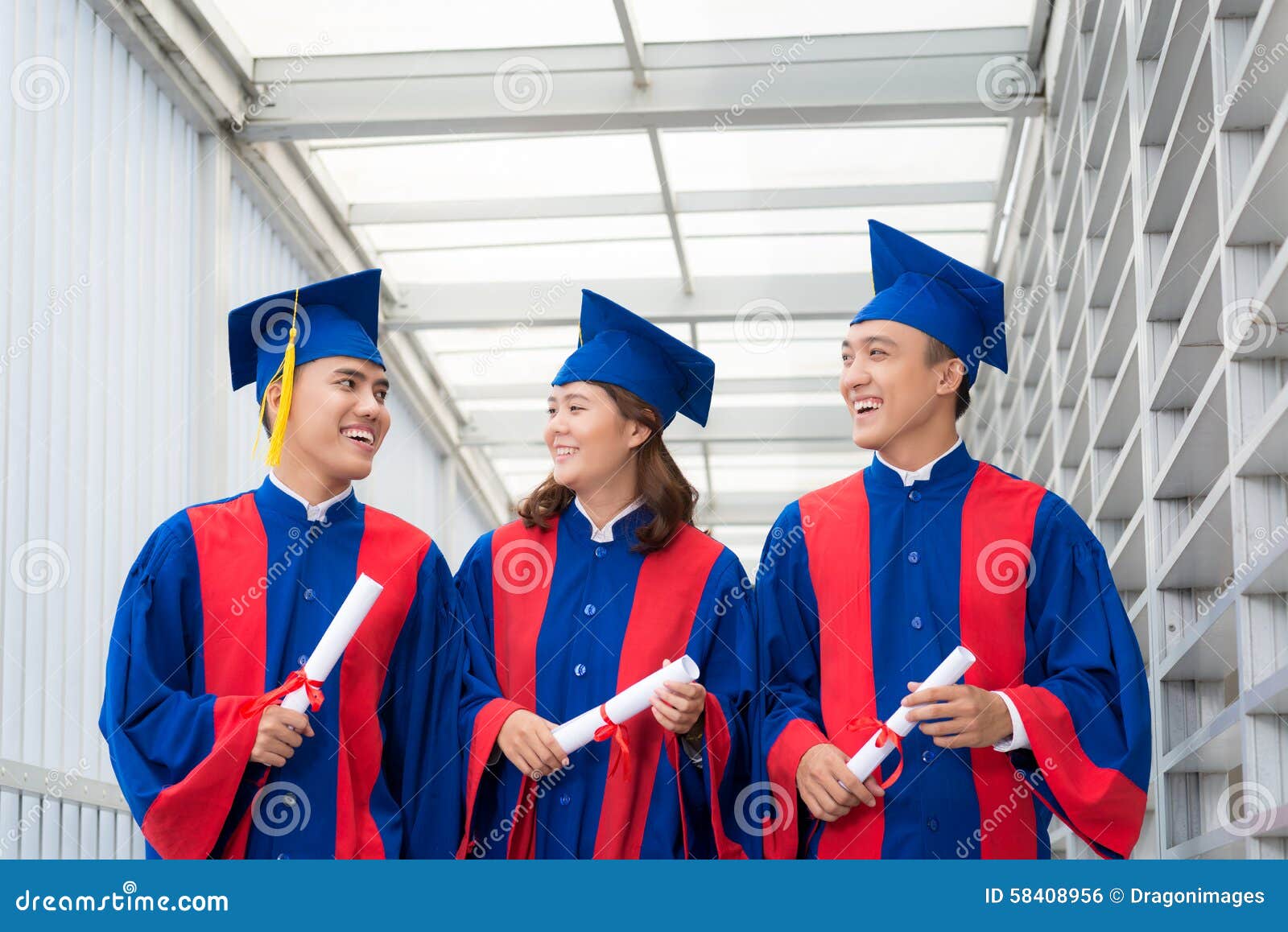 Students in Graduation Gowns Stock Photo - Image of lifestyle ...