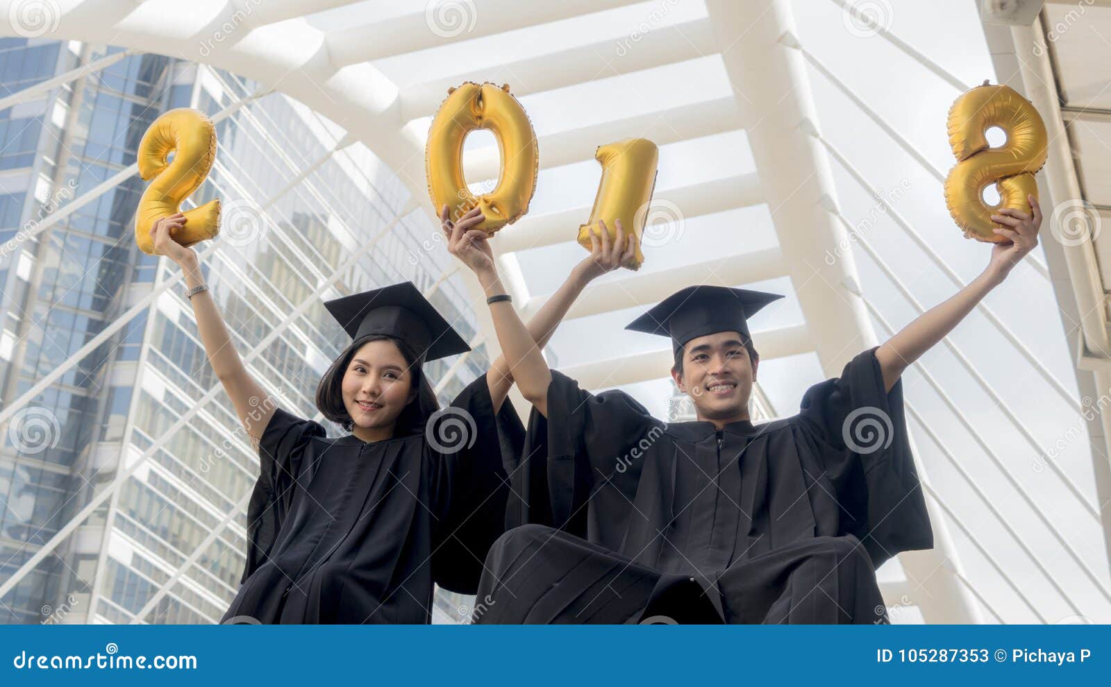 Students in Graduation Suit Sit and Gold Number Balloons 2018 Stock ...