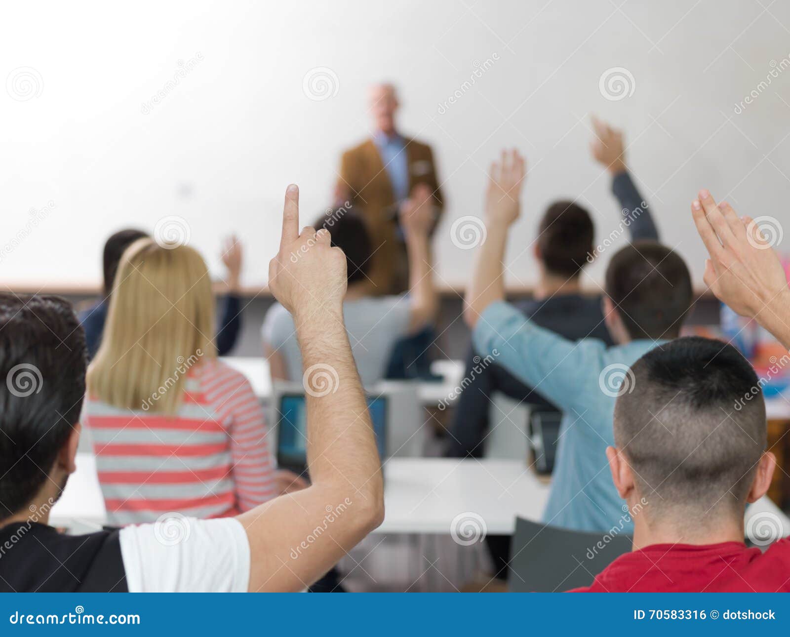 Students Raising Hands