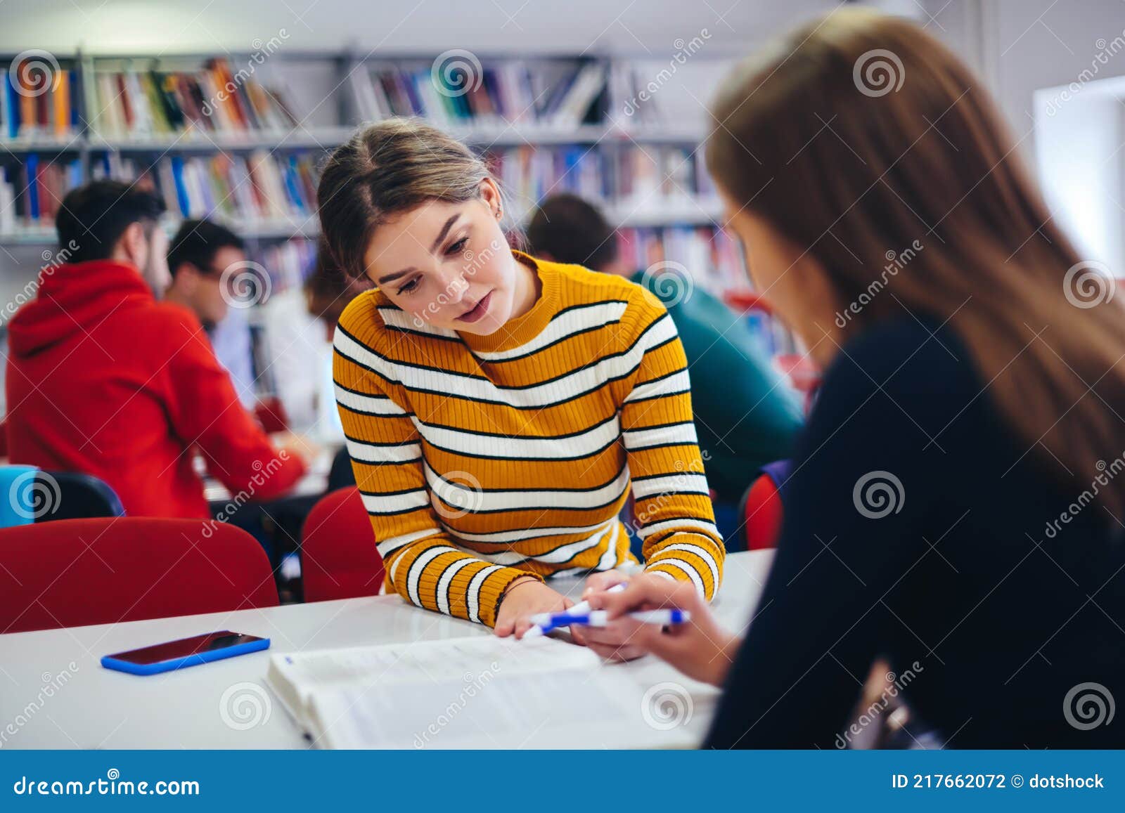 Students Group Working on School Project Together on Tablet Computer at ...