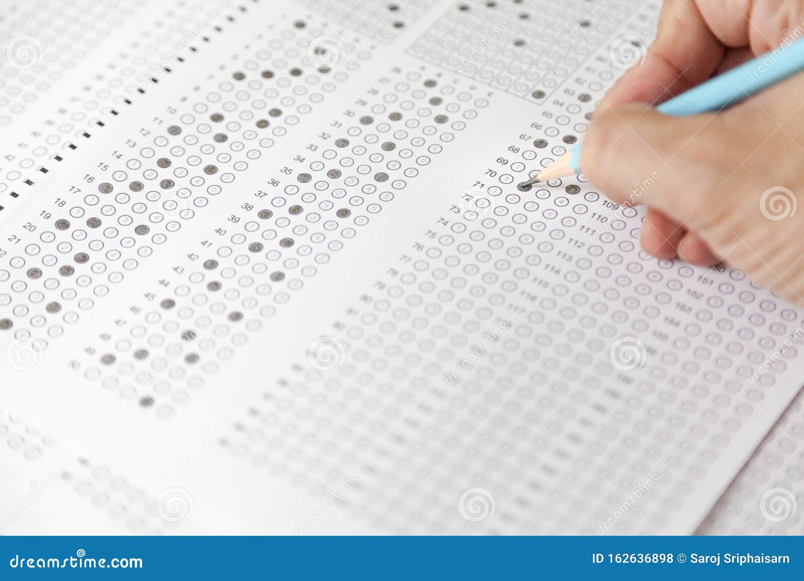 Students Hand Doing Exams Quiz Test Paper at School Stock Photo - Image ...