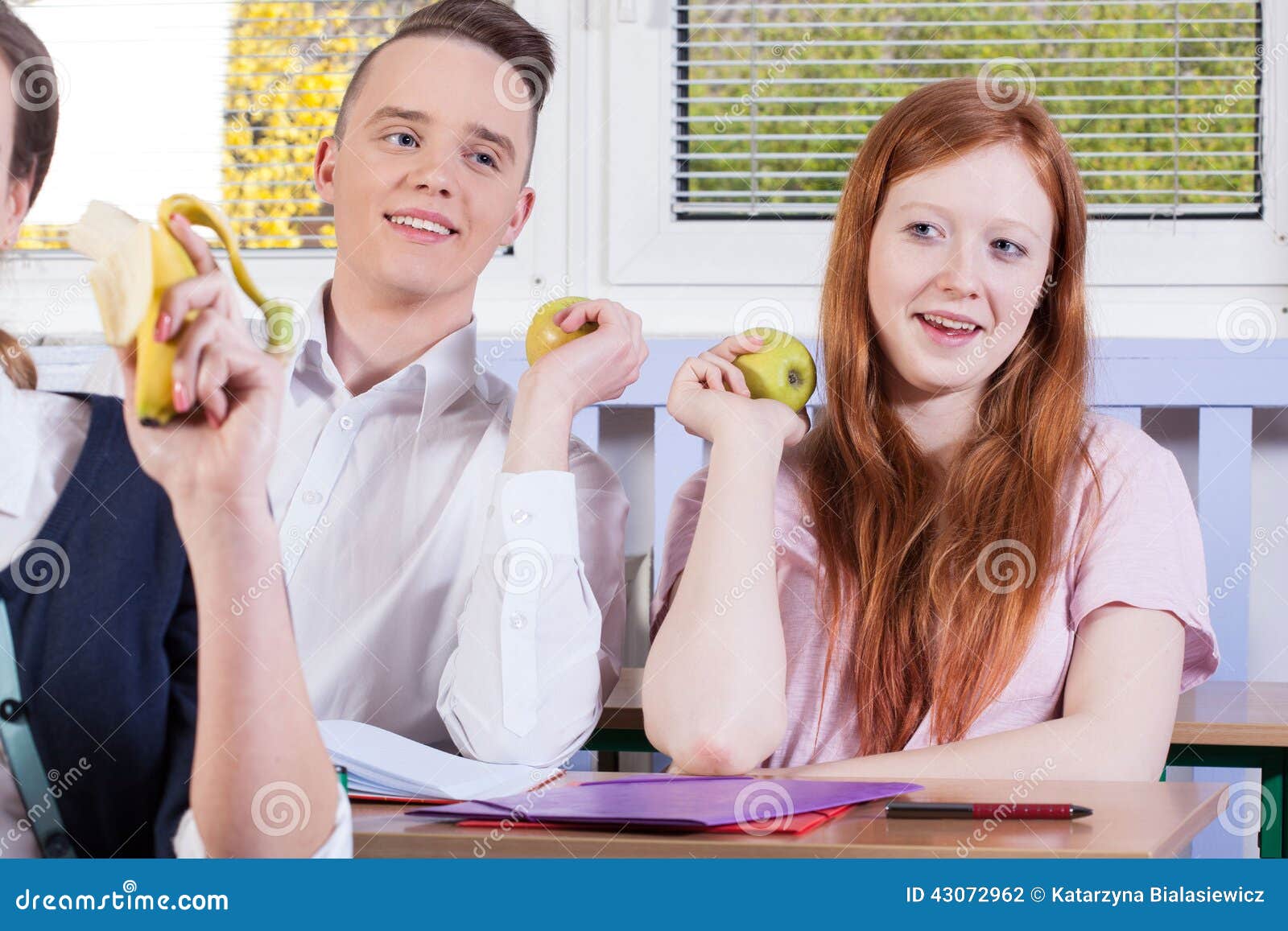 Students having lunch time stock photo. Image of banana - 43072962