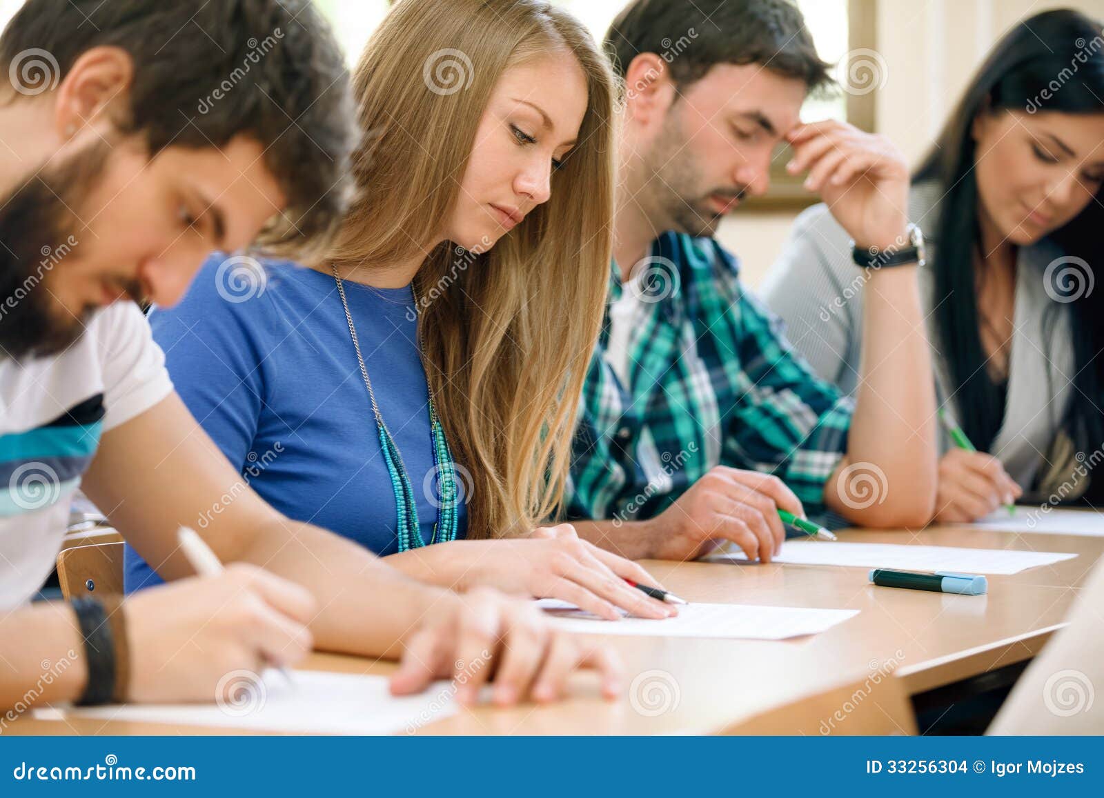 Students Having a Test in a Classroom Stock Photo - Image of male ...