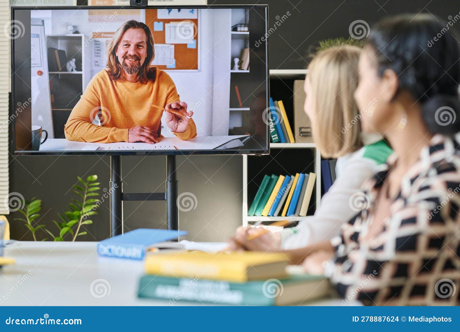 Students Having Video Call with Teacher Stock Photo - Image of adult ...