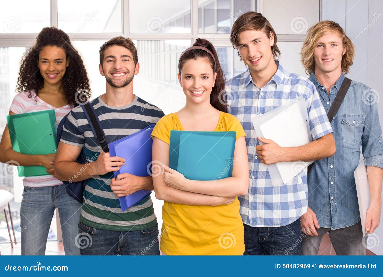 Students Holding Folders in College Stock Image - Image of lifestyle ...