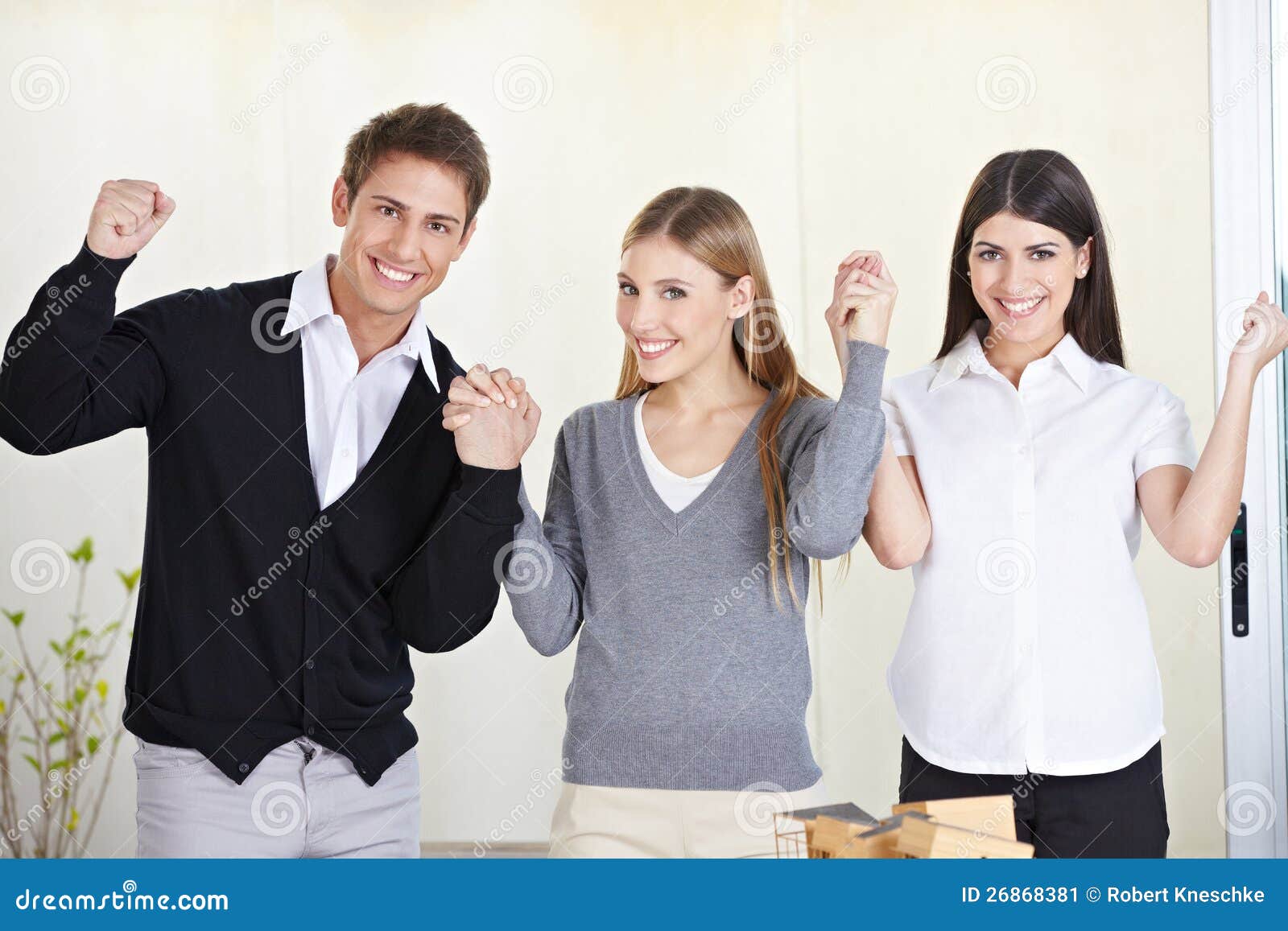 Students Holding Hands and Cheering Stock Image - Image of office ...