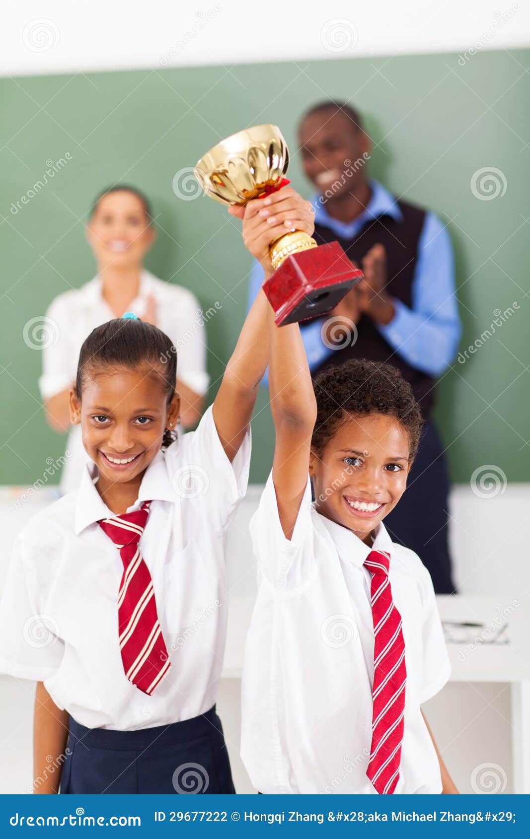 Students holding trophy stock photo. Image of prize, smile - 29677222