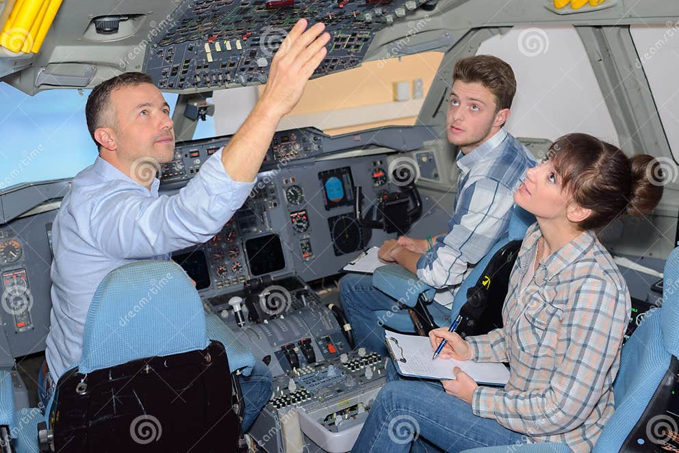 Students with Instructor in Aircraft Cockpit Stock Photo - Image of looking, seat: 282352852