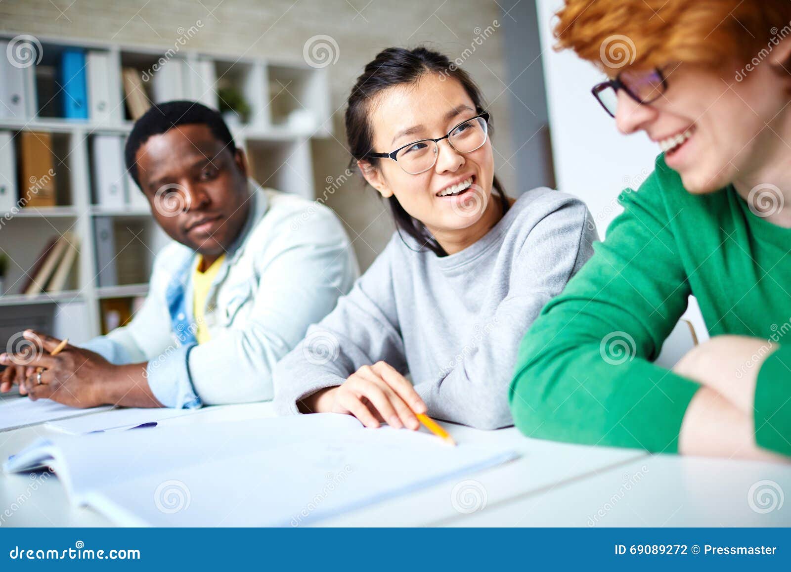 Students interacting stock photo. Image of multiethnic - 69089272