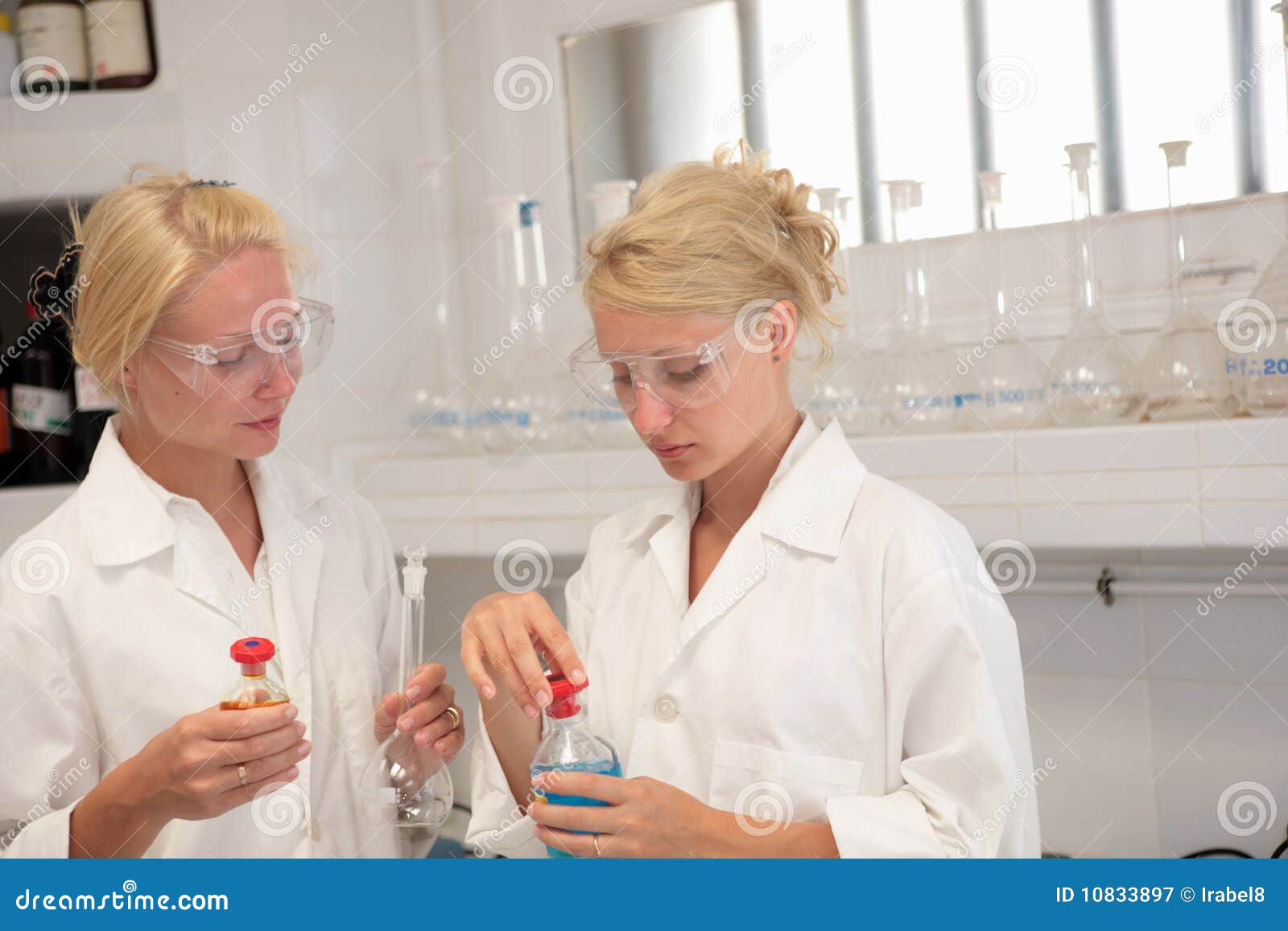 Students in the laboratory stock image. Image of woman - 10833897