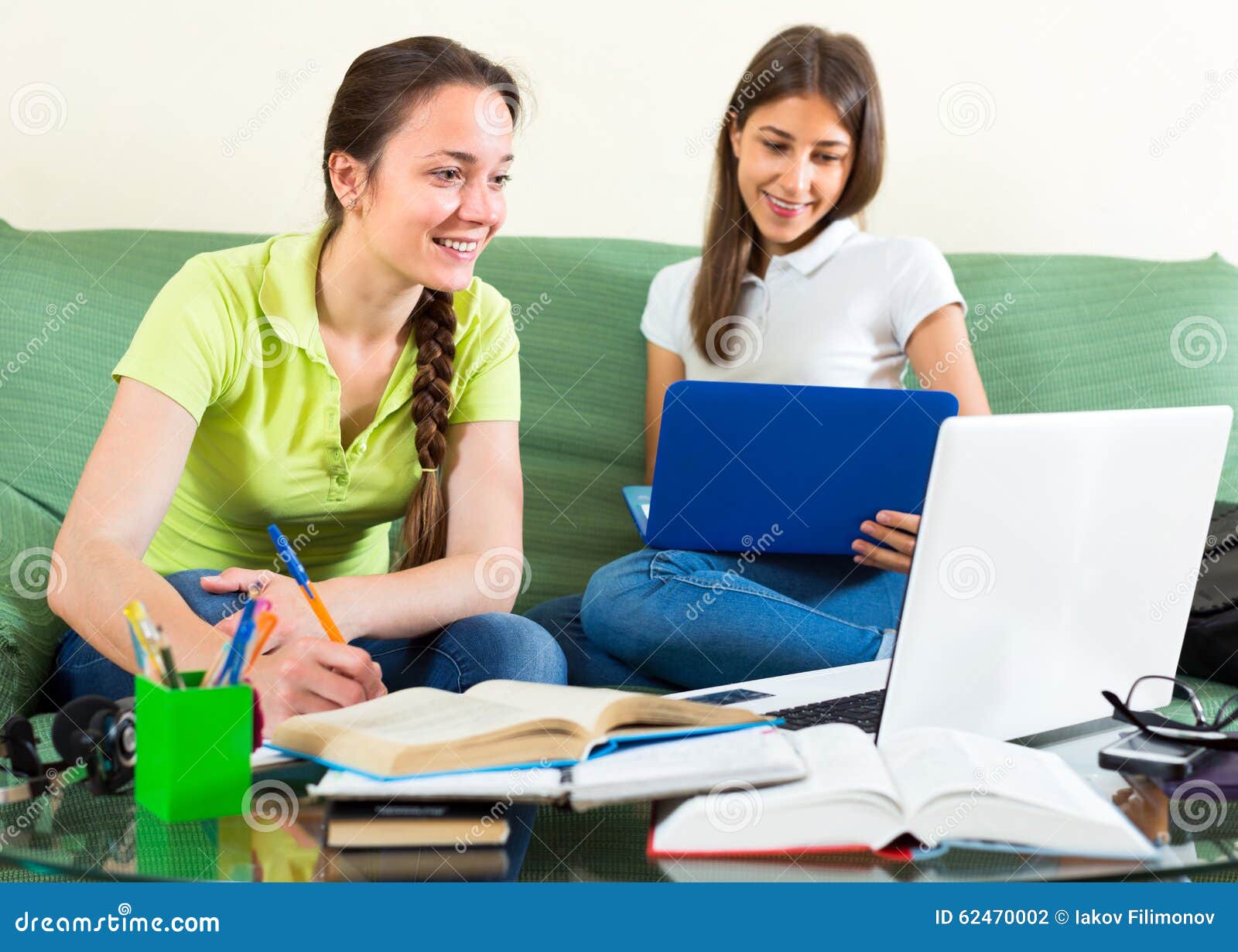 Students with Laptops Doing Homework Stock Photo - Image of smile ...