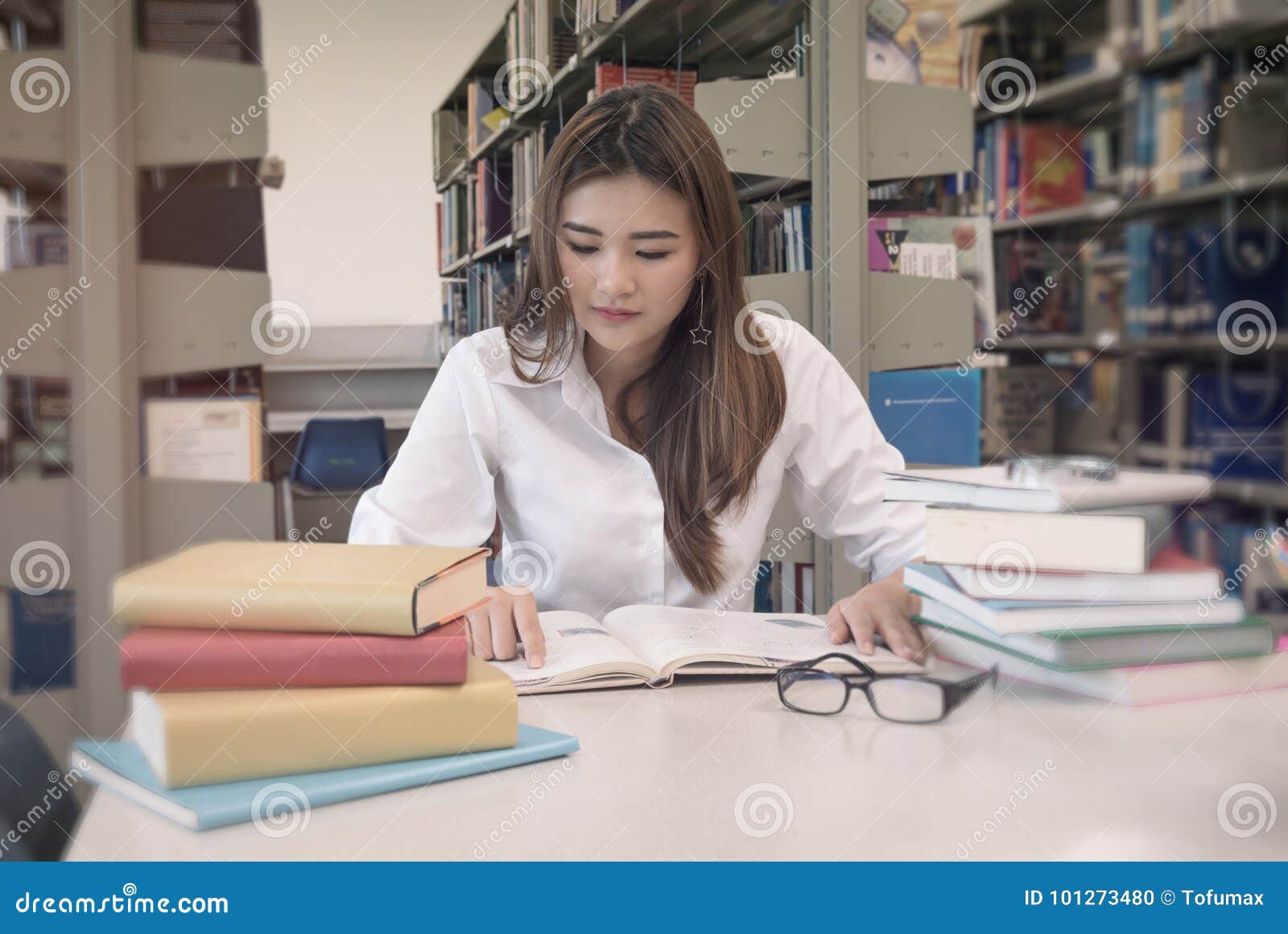 Students leading book stock photo. Image of education - 101273480