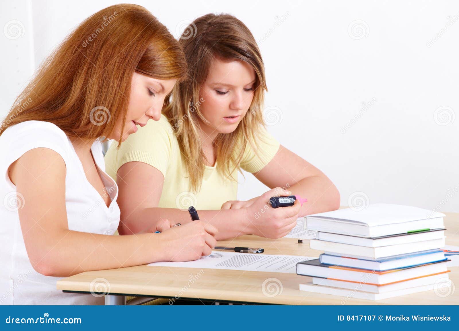 Students learning at desk stock image. Image of class - 8417107