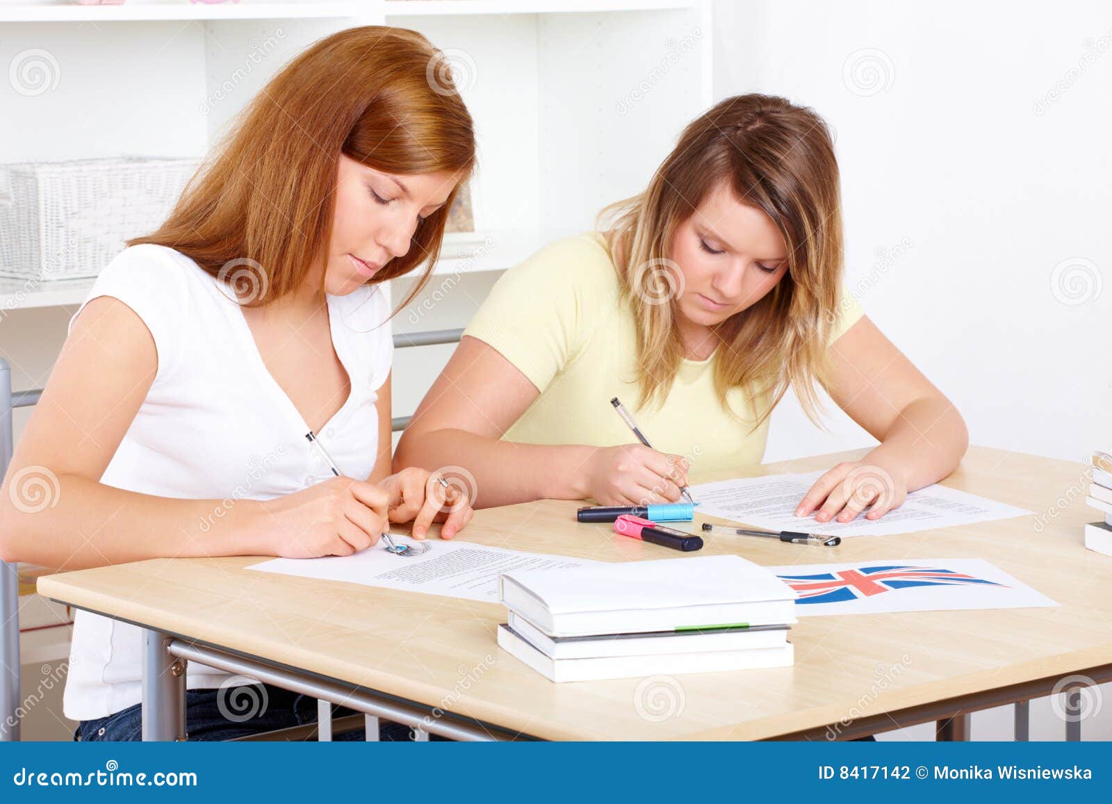 Students learning at desk stock photo. Image of britain - 8417142