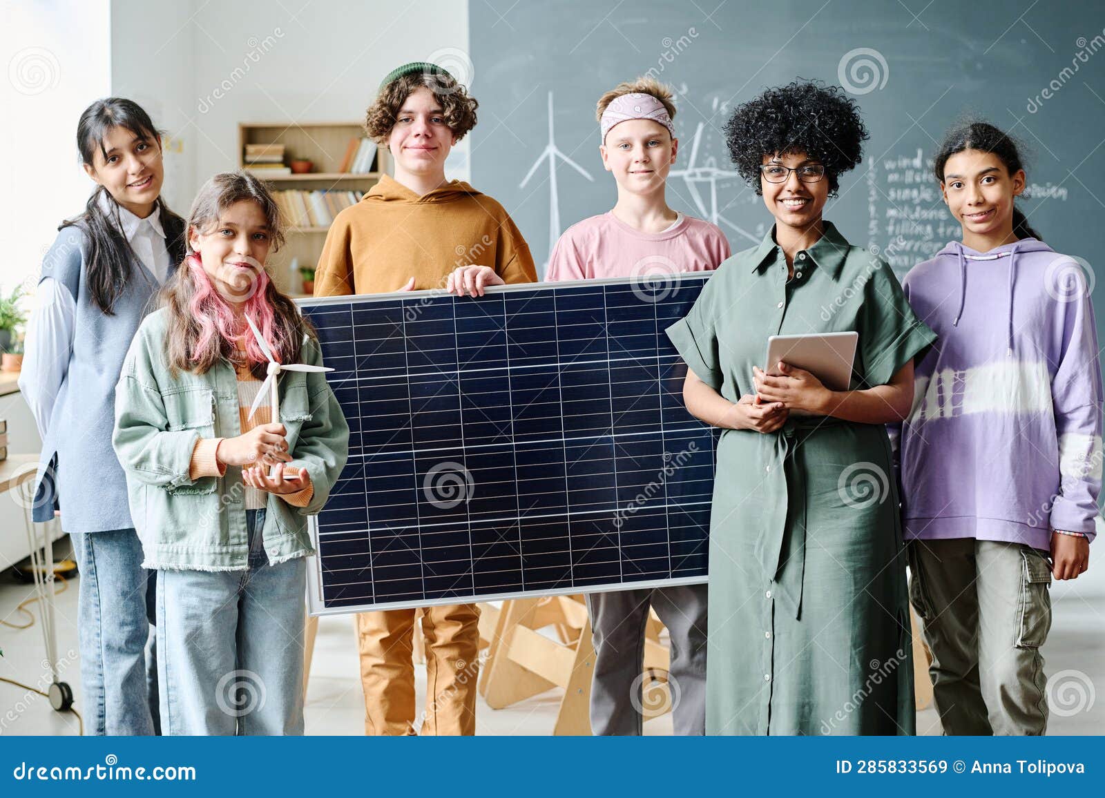 Students Learning the Work of Solar Panel Together with Teacher Stock ...