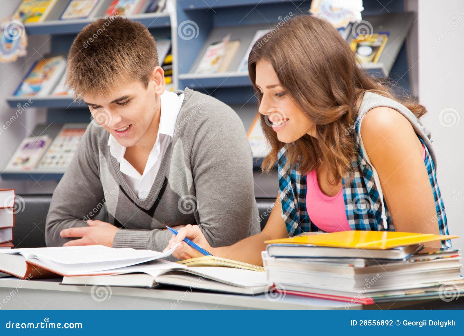 Students in a library stock photo. Image of background - 28556892
