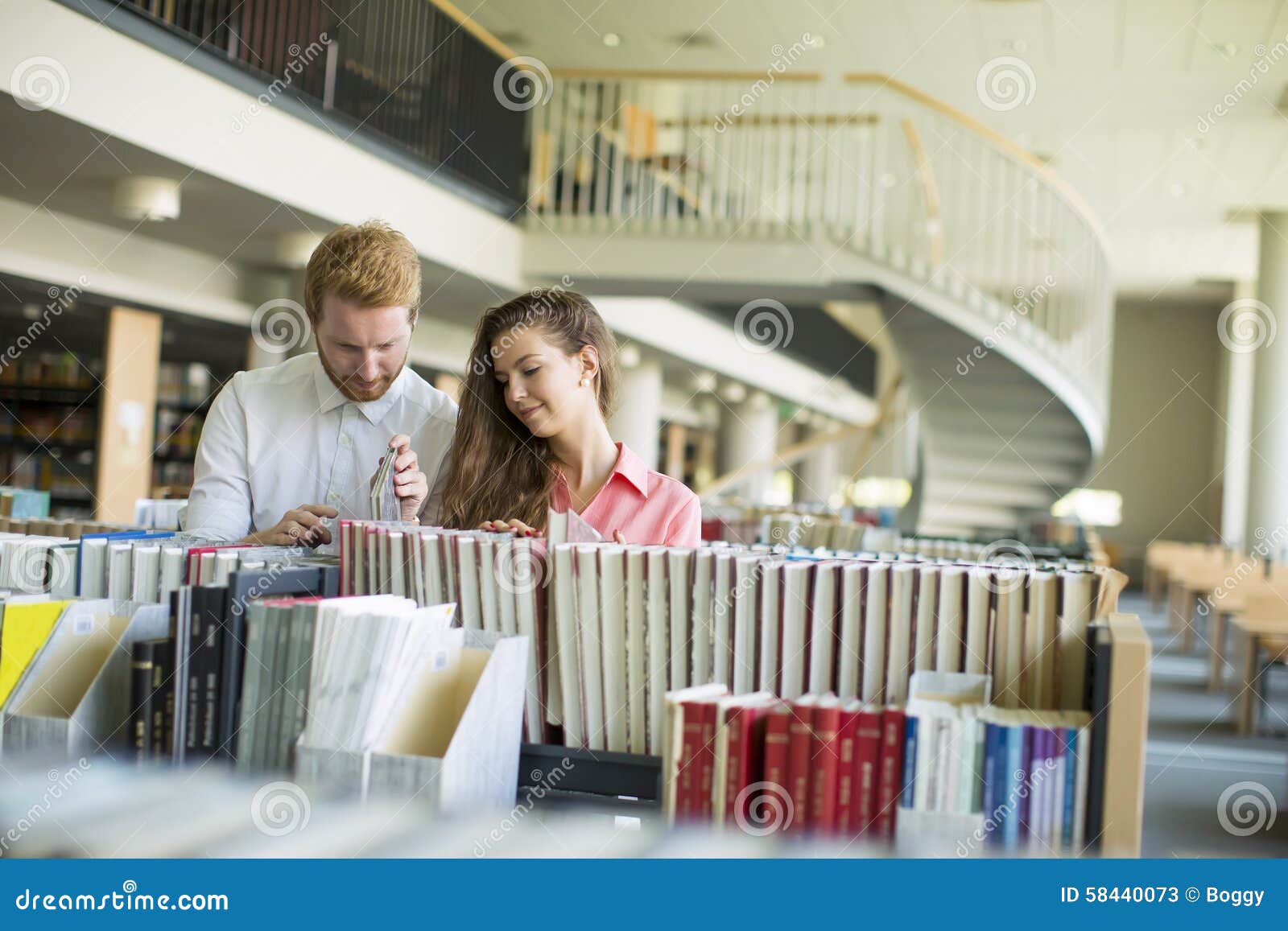 Students in the library stock image. Image of university - 58440073