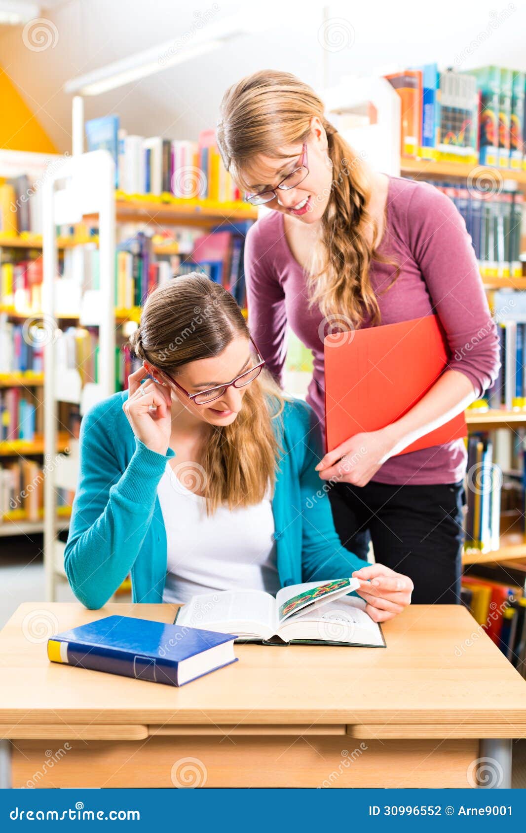 Students in Library are a Learning Group Stock Photo - Image of ...