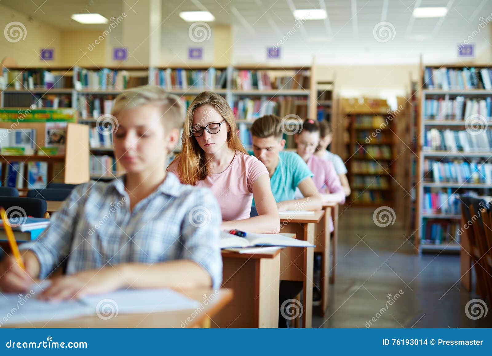 Students in library stock photo. Image of test, teenager - 76193014