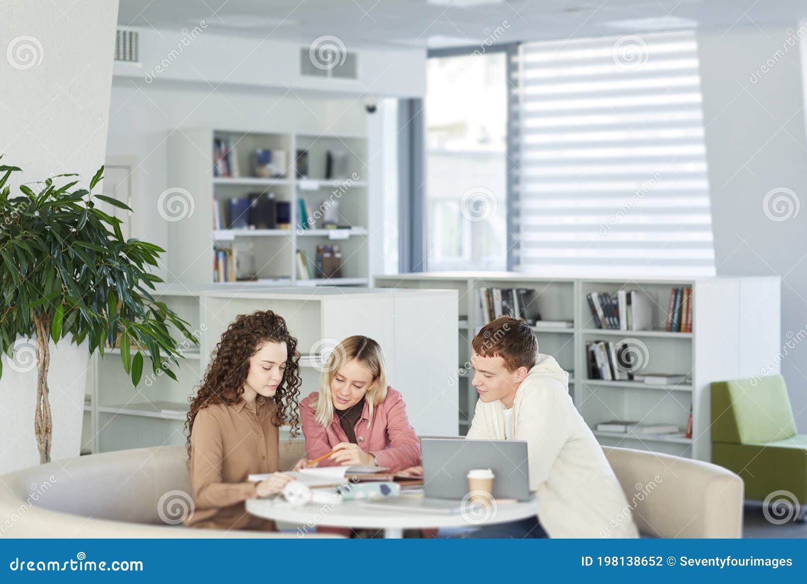 Students in Library stock photo. Image of looking, indoors - 198138652