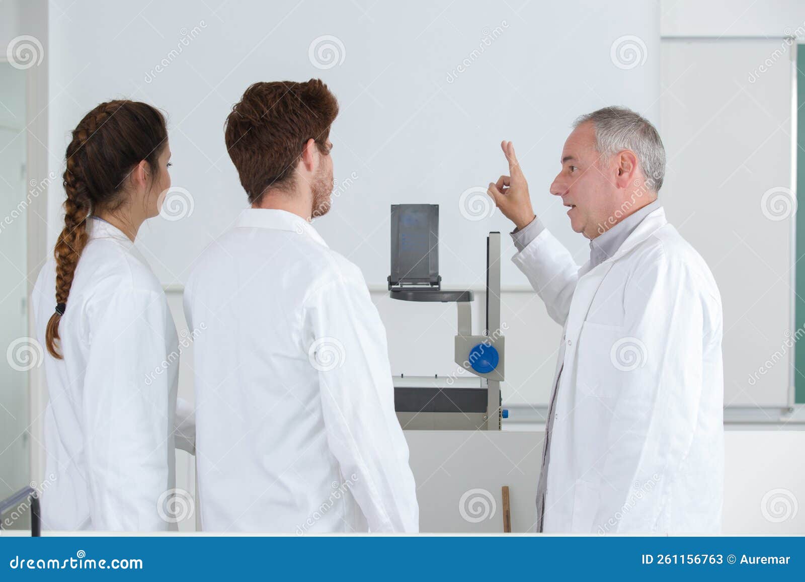 Students Listening Carefully To Their Teacher during Science Class ...