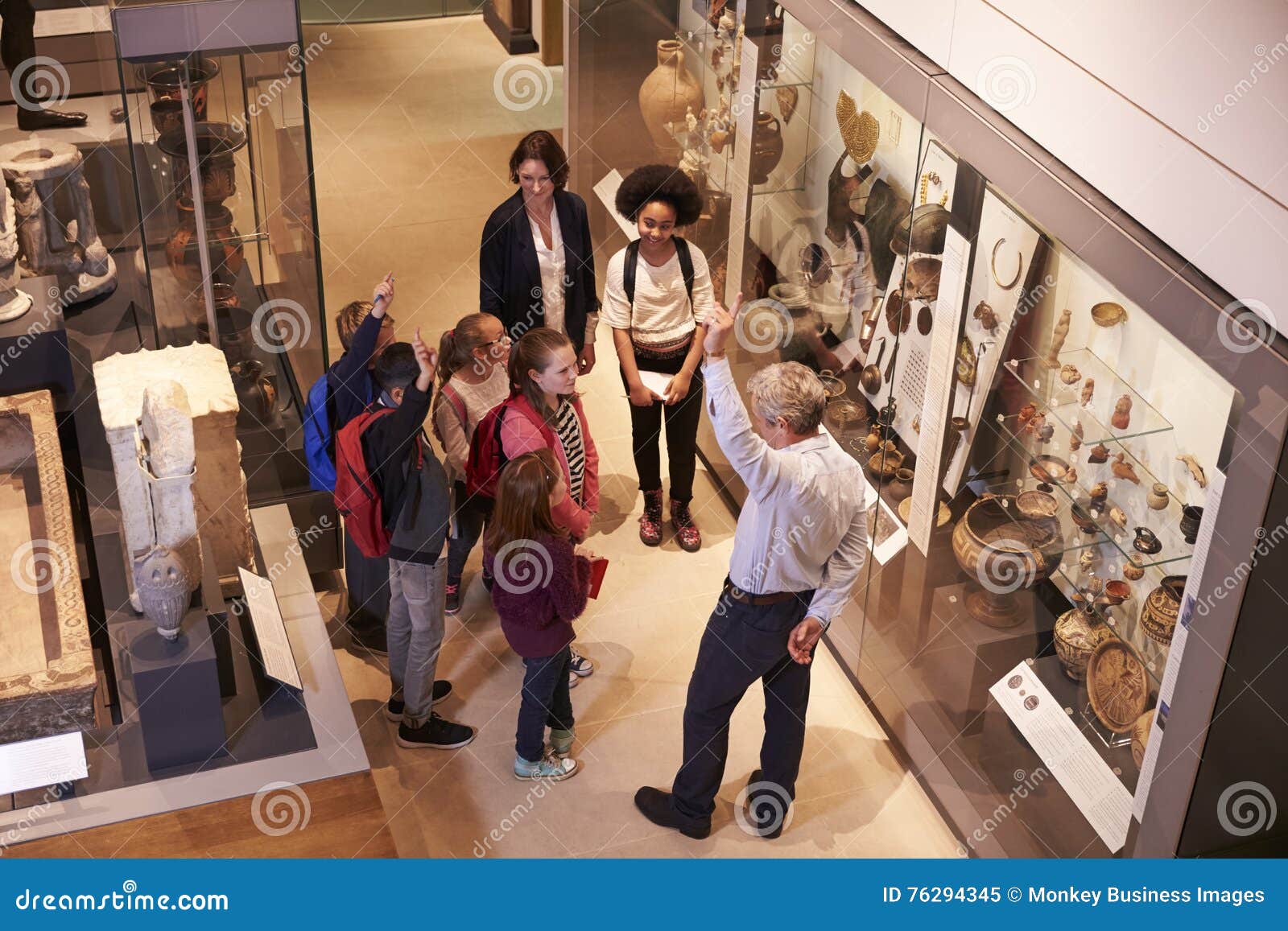 Students Looking at Artifacts in Case on Trip To Museum Editorial Image ...