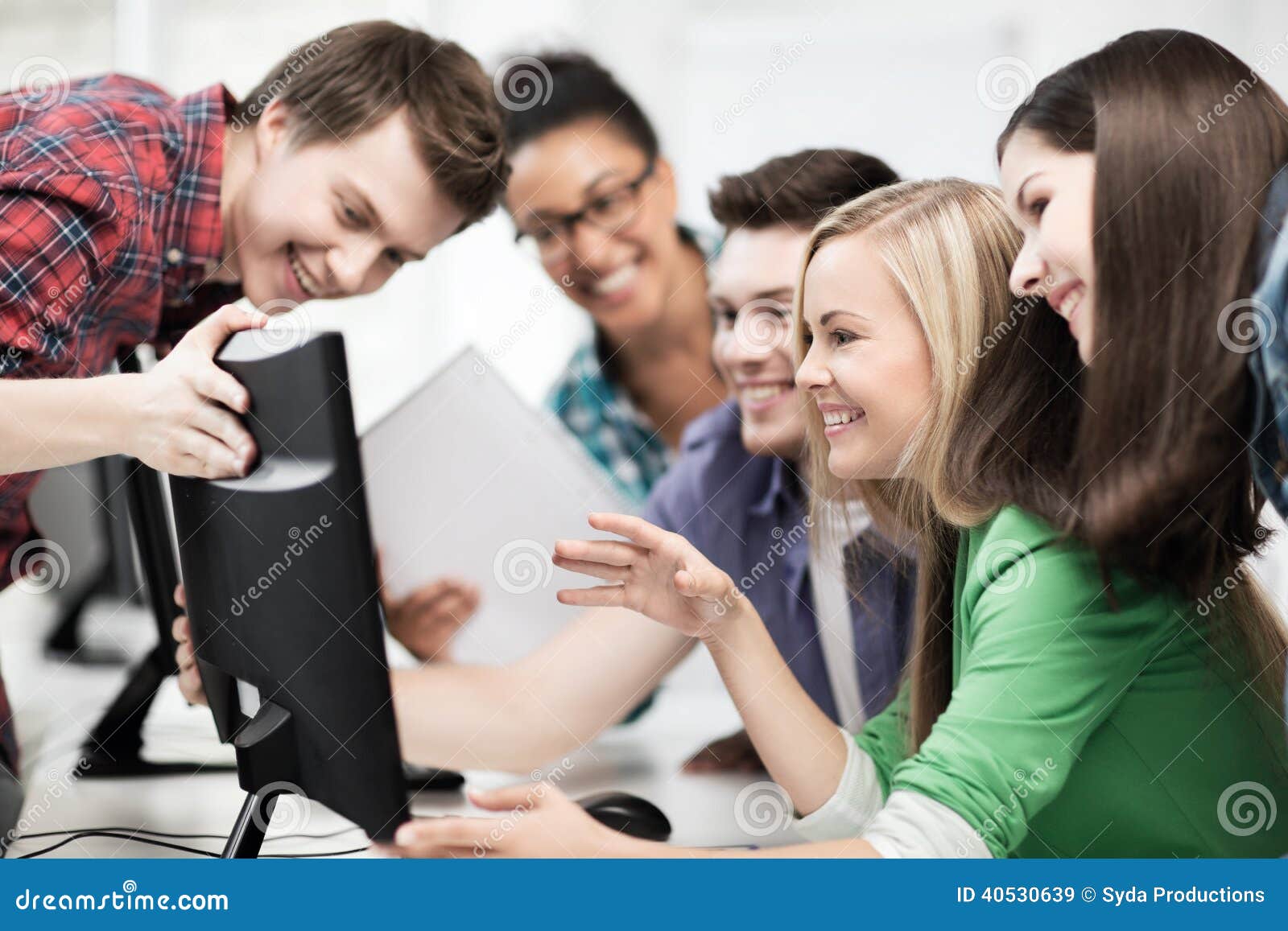 Students Looking at Computer Monitor at School Stock Image - Image of ...